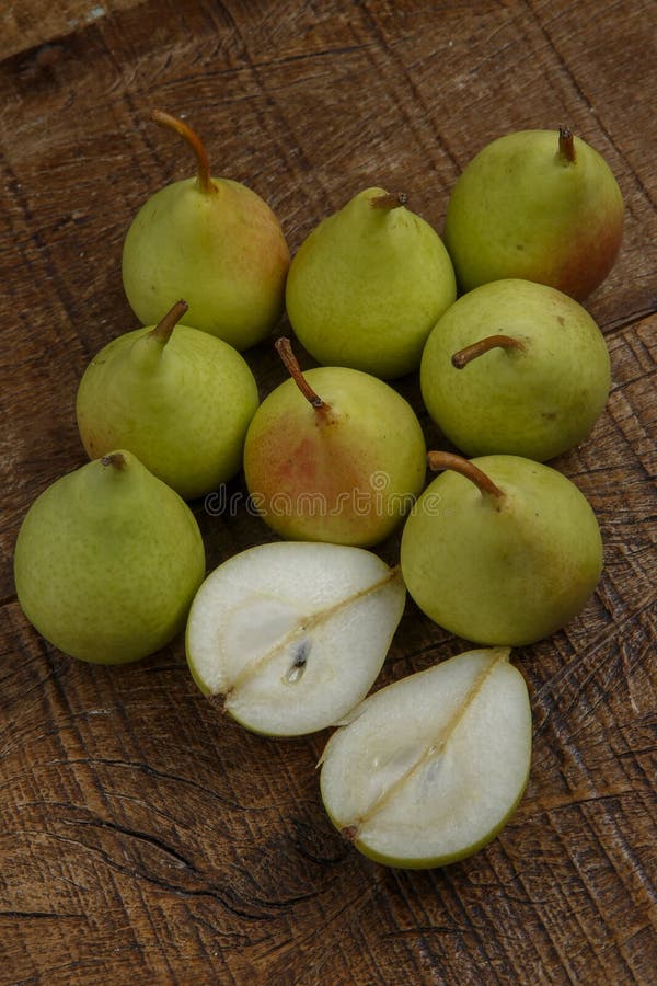 Pear on a Rustic Wooden Table Stock Photo - Image of sweet, fruit ...