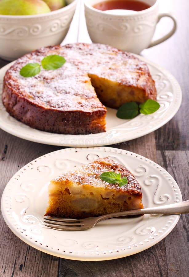 Pear Sponge Cake with Icing Sugar Stock Photo - Image of plate, snack ...