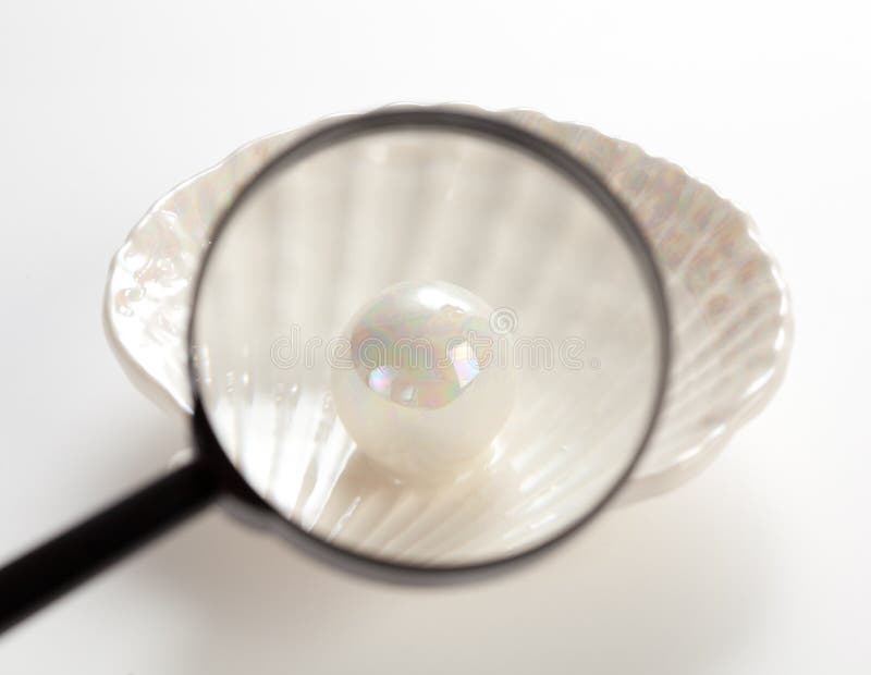 Pearl Under Magnifying Glass Stock Photo - Image of magnifying, gift ...