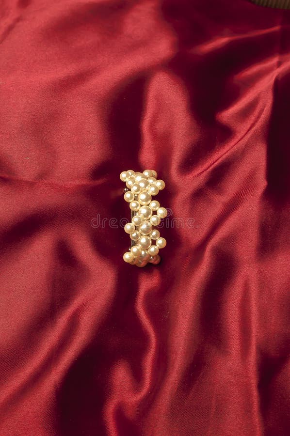 Pearls isolated on red stock image. Image of luxurious - 21986977