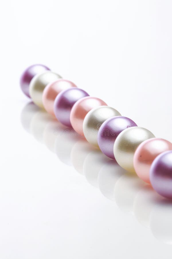 A round, shiny pearl stock photo. Image of love, expensive - 127130614