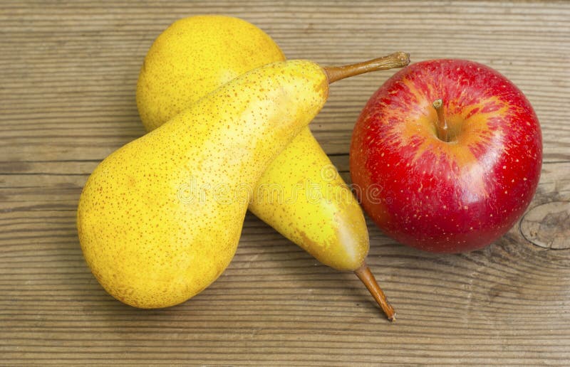 Pears, Apple on Old Wooden Table Stock Photo - Image of small, fresh ...