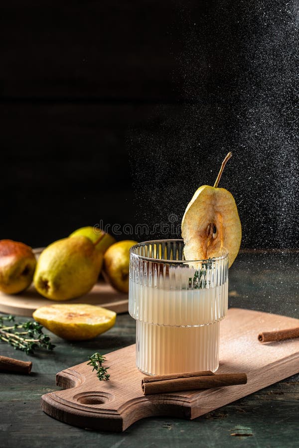 Pears Drink. Pear Mulled Cider. with Spices, Thyme, Cinnamon and Honey ...
