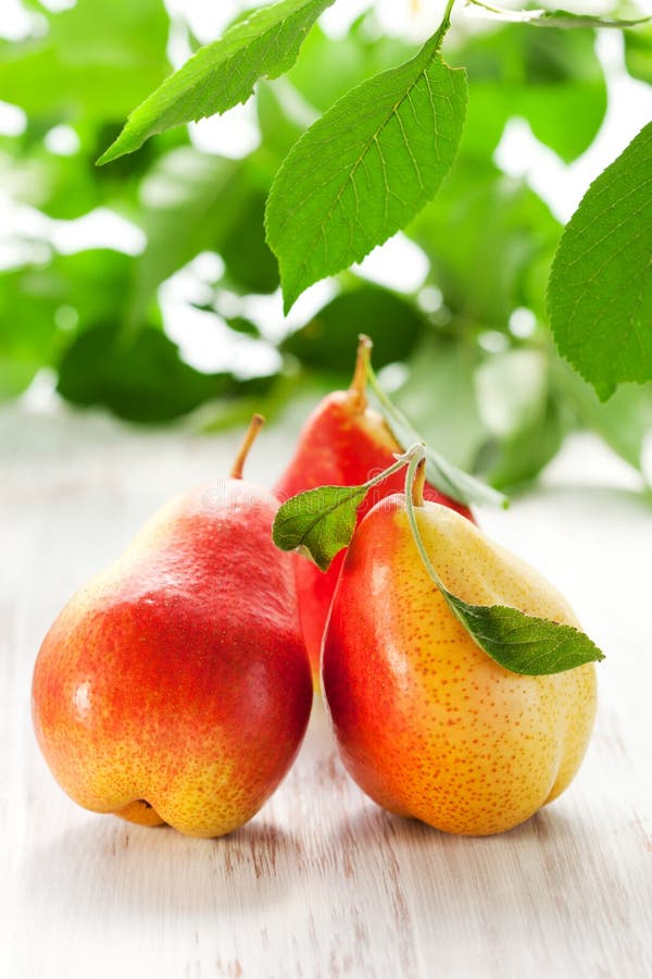 Fresh Pears with Red and Yellow Skin Stock Photo - Image of market ...