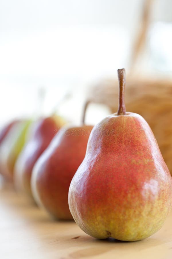 Pears in a row stock photo. Image of ripe, fruit, pears - 26666052