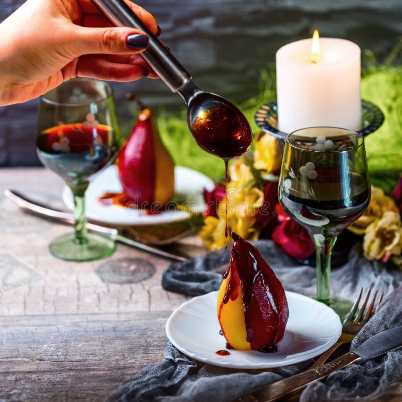 Pears in Wine. Romantic Dinner Stock Image - Image of beverage, flame ...