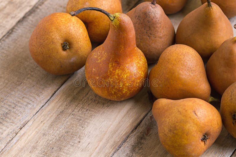 Pears on wood stock image. Image of brown, ripe, rustic - 69893357