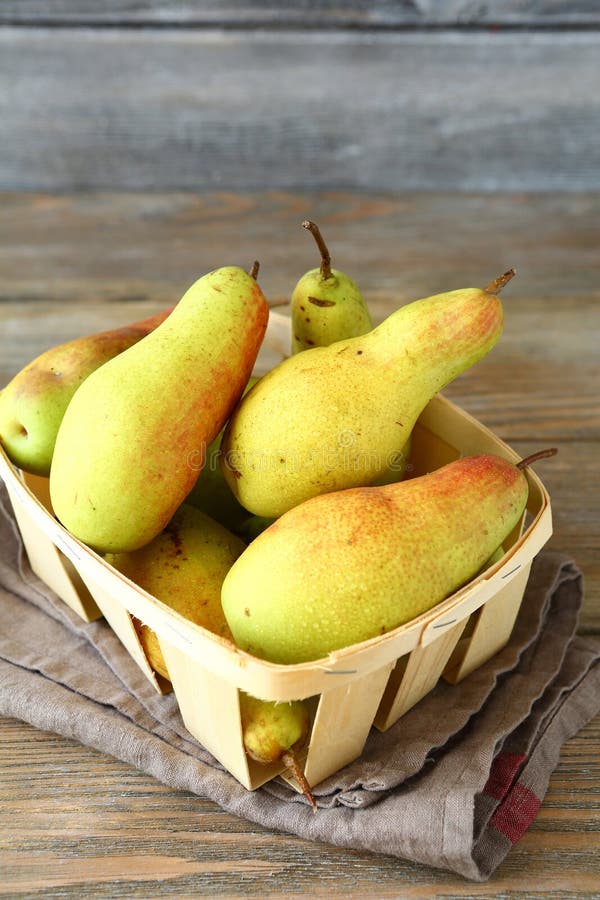Ripe pears in a wooden box stock photo. Image of tasty - 47795180