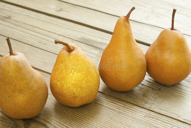 Pears on wooden table stock photo. Image of healthy, fruit - 21097742