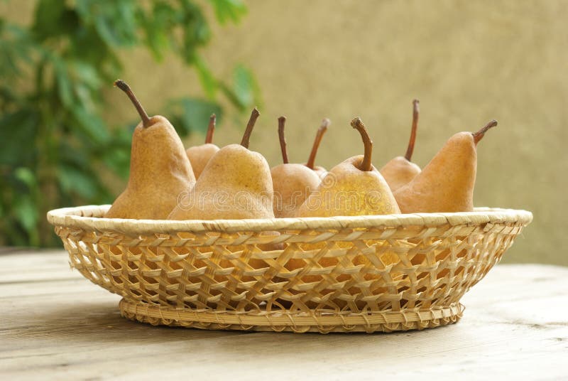 Pears on wooden table stock photo. Image of desk, plant - 21097800