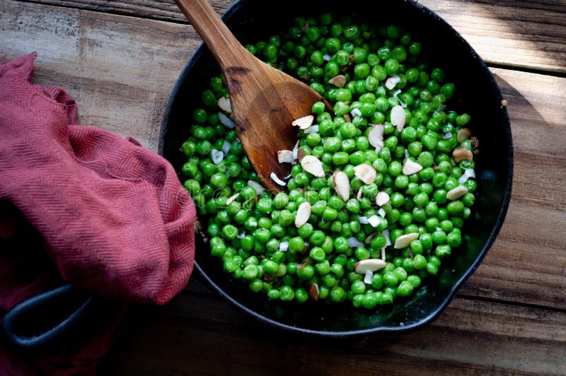 Peas with Toasted Almonds stock image. Image of sauted - 65993421