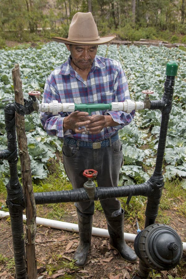 Small Farmer Checking the Well Functioning of His Water Irrigation ...