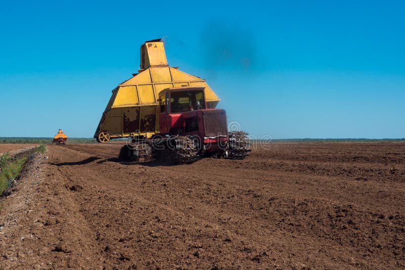 Peat extraction in a field stock image. Image of land - 44735183