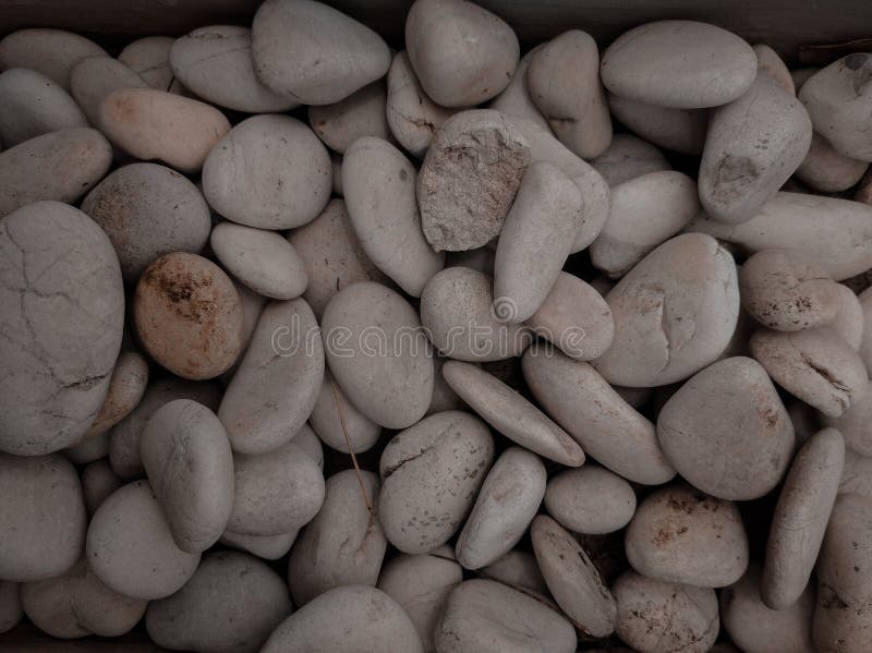 A Pebble Suitable for the Background Stock Photo - Image of sand ...