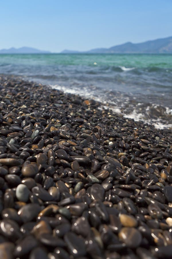 Pebble beach stock photo. Image of scene, background - 23999370