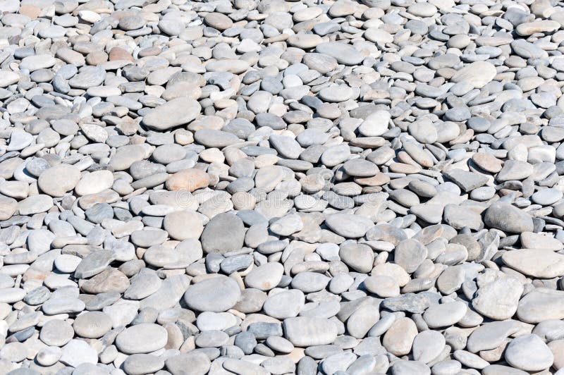 A Pebble Beach. Pebbles on the Beach Close-up Stock Photo - Image of ...