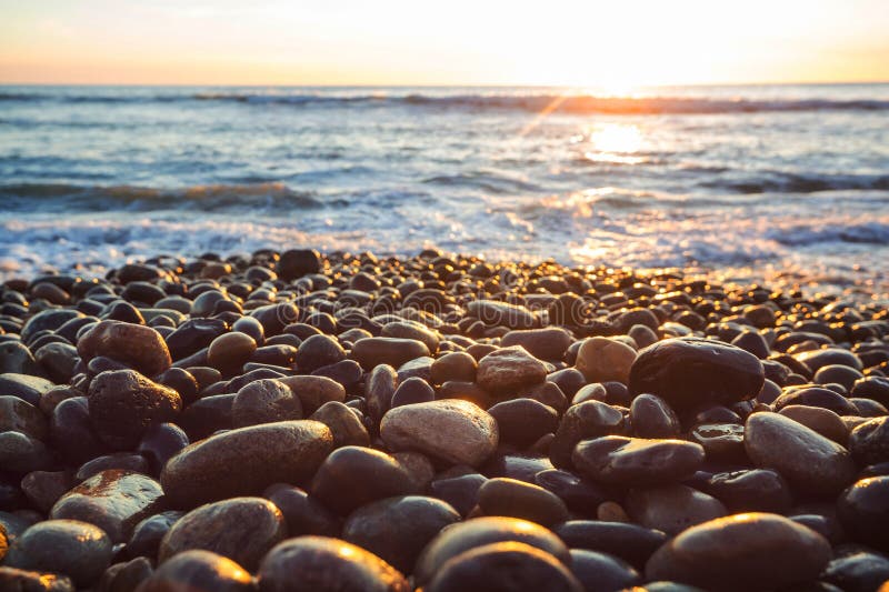 Pebble beach stock photo. Image of stone, wave, ocean - 272404268