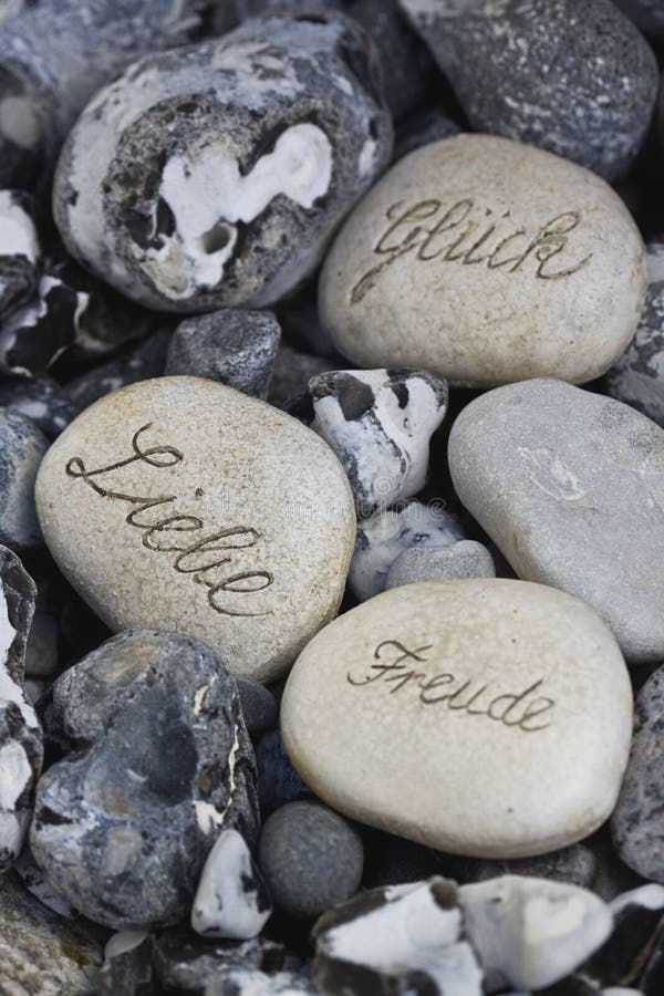 Pebble with German Words stock photo. Image of german - 134494368