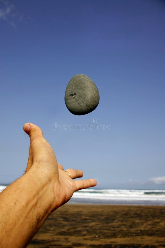 Pebble and Hand stock image. Image of throw, ocean, finger - 278573