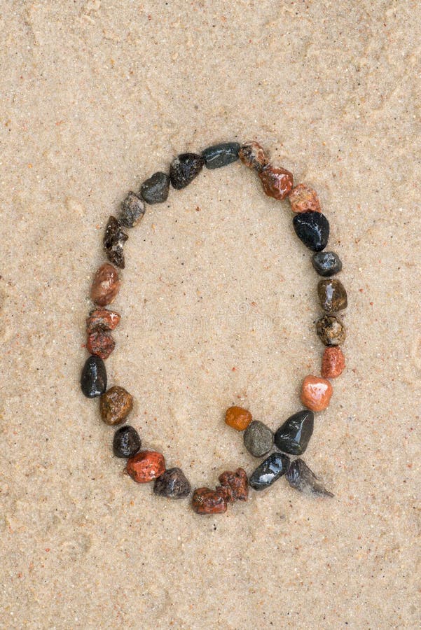 Pebble Q Letter Sand Stock Photos - Free & Royalty-Free Stock Photos ...