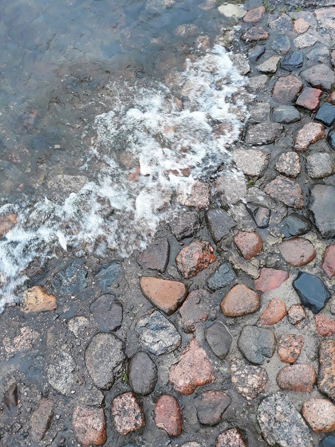 Pebble river coast stock image. Image of edge, rocks - 206258579