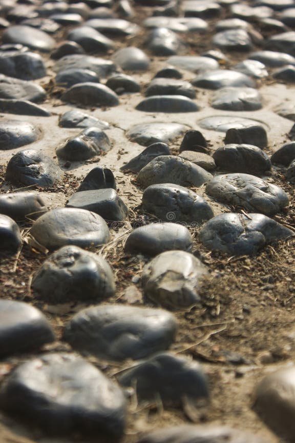 Pebble road Stone stock photo. Image of closeups, floor - 81866394