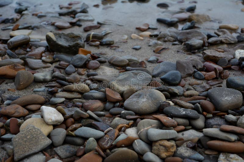 Pebble Stones on the River Shore. Closeup Stock Image - Image of rock ...