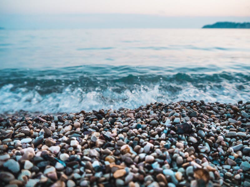 Pebble Stones and Waves at the Beach Stock Photo - Image of rock, ocean ...