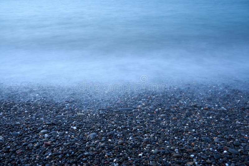 Pebble in Water on the Beach. Natural Background Stock Image - Image of ...