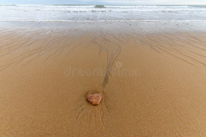 Pebbled on a Beach at the Atlantic Ocean. Stock Image - Image of sand ...