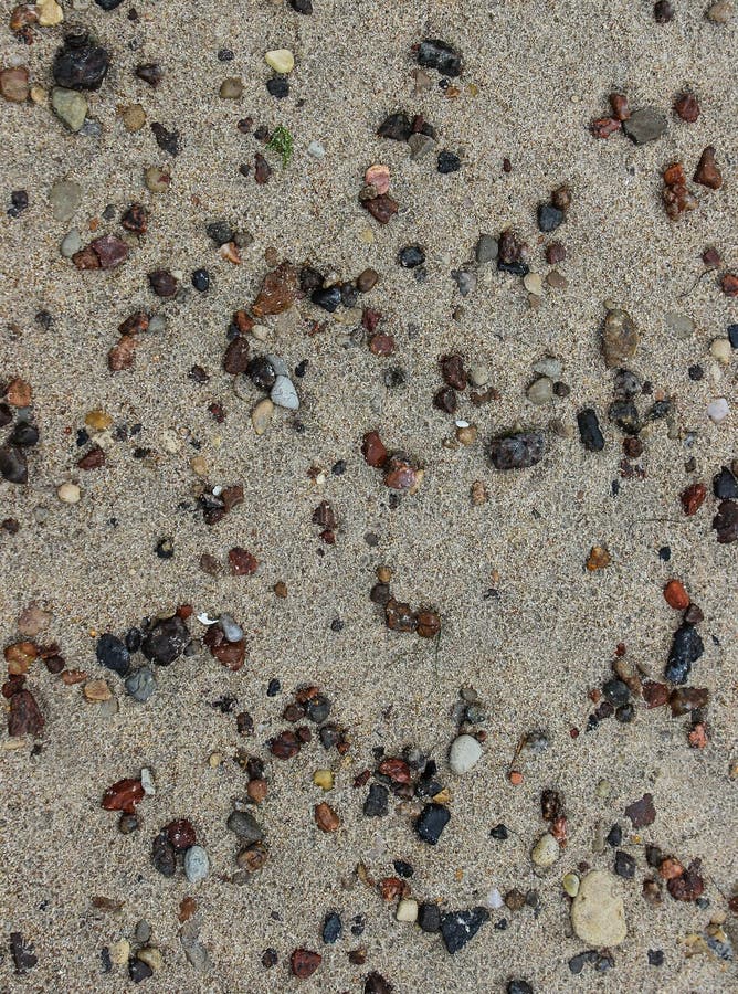 Pebbles on a Beach stock photo. Image of sandy, sand - 98846908