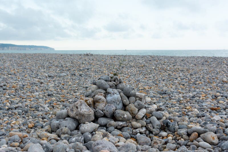 Pebbles on a beach stock image. Image of rolled, pebble - 258300787