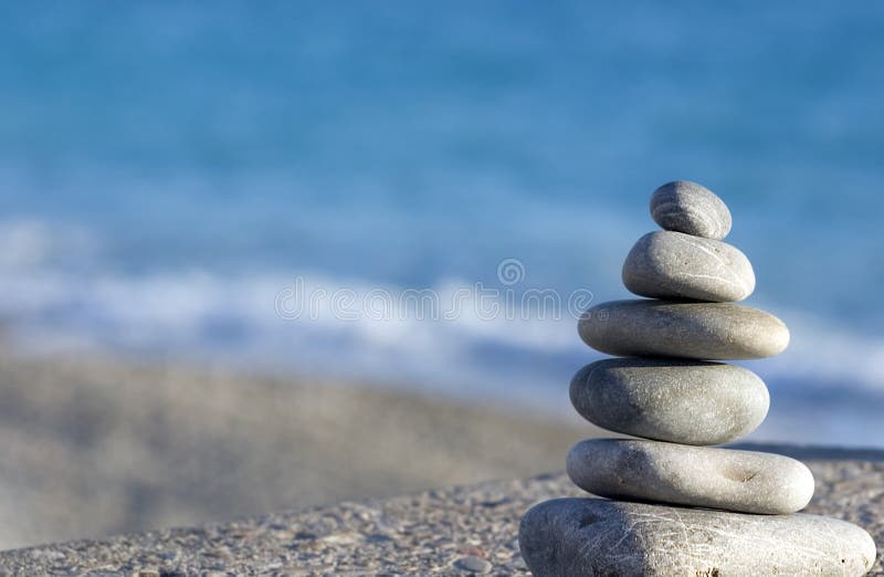 Pebbles on the blue sea stock photo. Image of simple, stones - 434580
