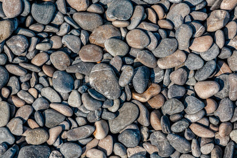 Pebbles stock photo. Image of coastline, blue, objects - 207902512