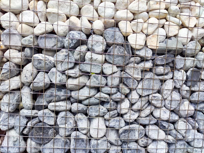 Decorative Pebbles Arranged in a Grid, Showcasing Various Shades of ...