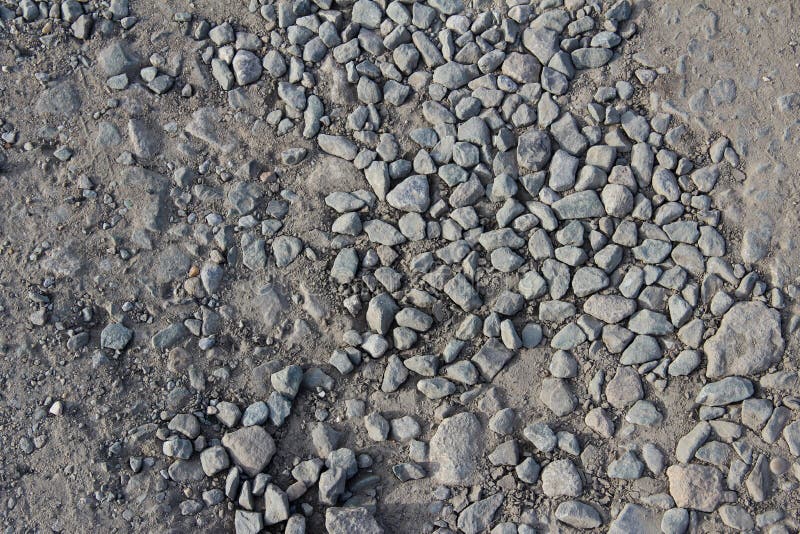 Pebbles on the ground stock image. Image of nature, grey - 124534875