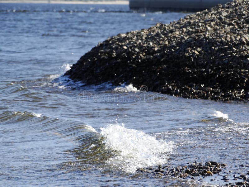Pebbles on the river Bank stock image. Image of rocky - 129673869