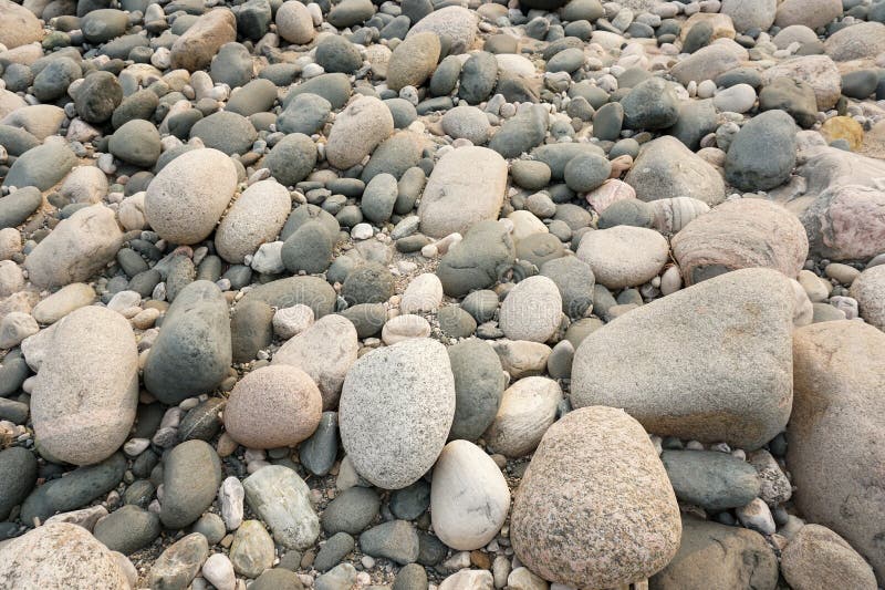 Pebbles on the river bed stock image. Image of flooring - 368879683