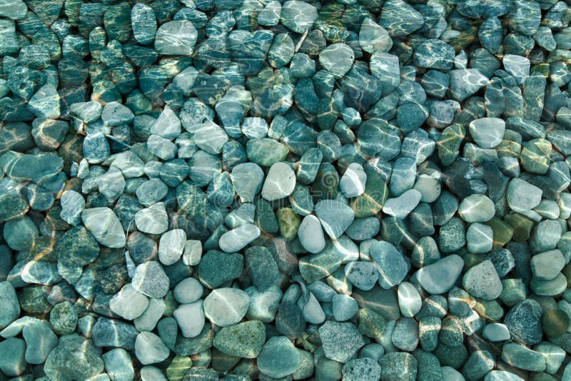 Pebbles and Rocks Under Water Background Stock Image - Image of level ...