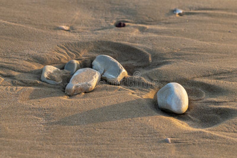 Pebbles in the Sand at Twilight Sunset Stock Photo - Image of sand ...