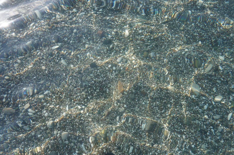 Pebbles on a seabed stock photo. Image of nature, texture - 121885504