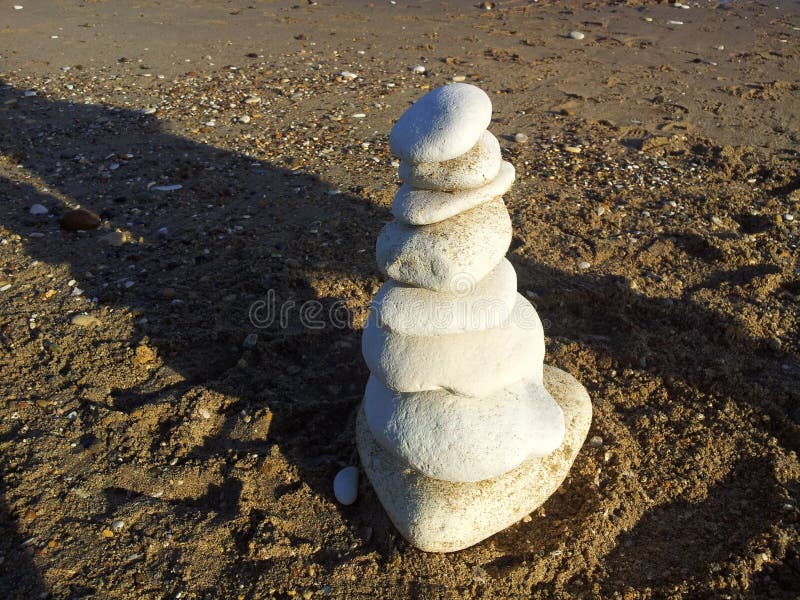 Pebbles Stacked on the Beach Stock Photo - Image of coast, nature: 84315268