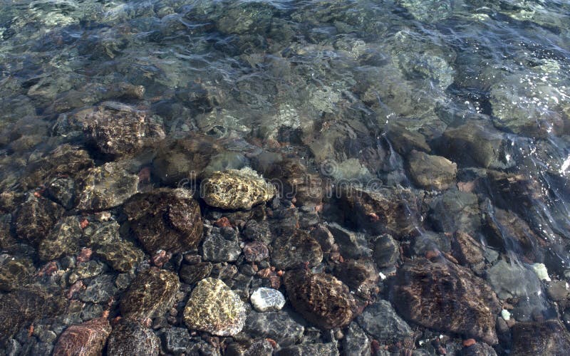 Pebbles Under Water stock image. Image of tropical, ripple - 101226637