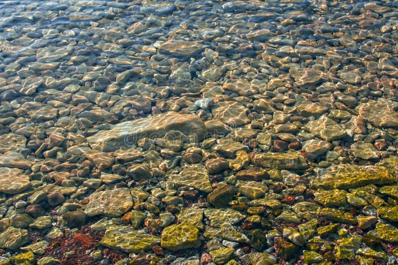 Pebbles Under Water in Many Colors and Formations Stock Photo - Image ...