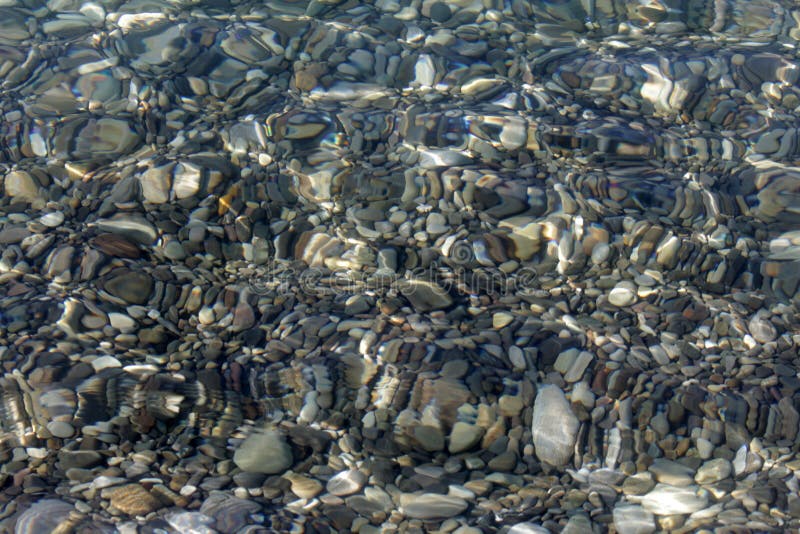 Pebbles Under Water on the Sea. Stock Photo - Image of rocks, dark ...