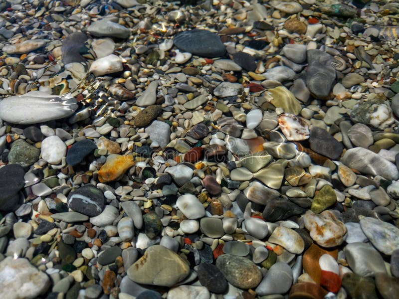 Pebbles under the water stock image. Image of pebbles - 122143599