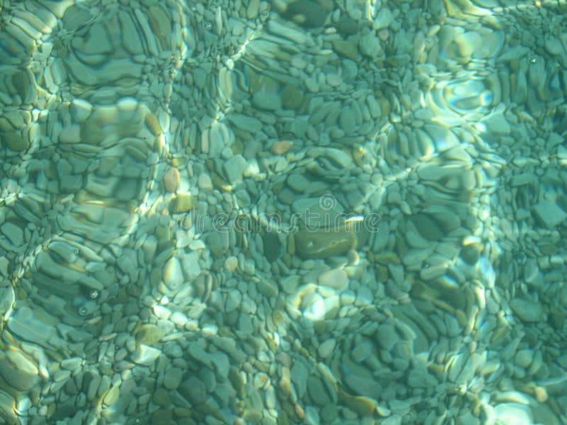 Pebbles Visible in Transparent Water on the Seabed Stock Image - Image ...