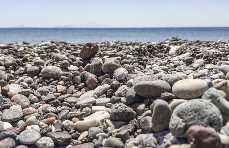 A pebbly beach stock photo. Image of tranquil, rock, coastline - 86658094
