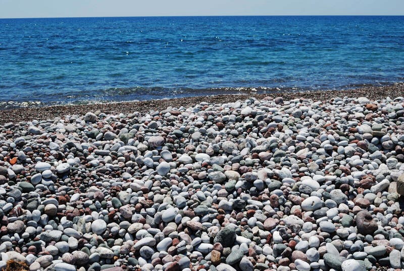 Pebles on beach stock image. Image of pebles, water, white - 10099543