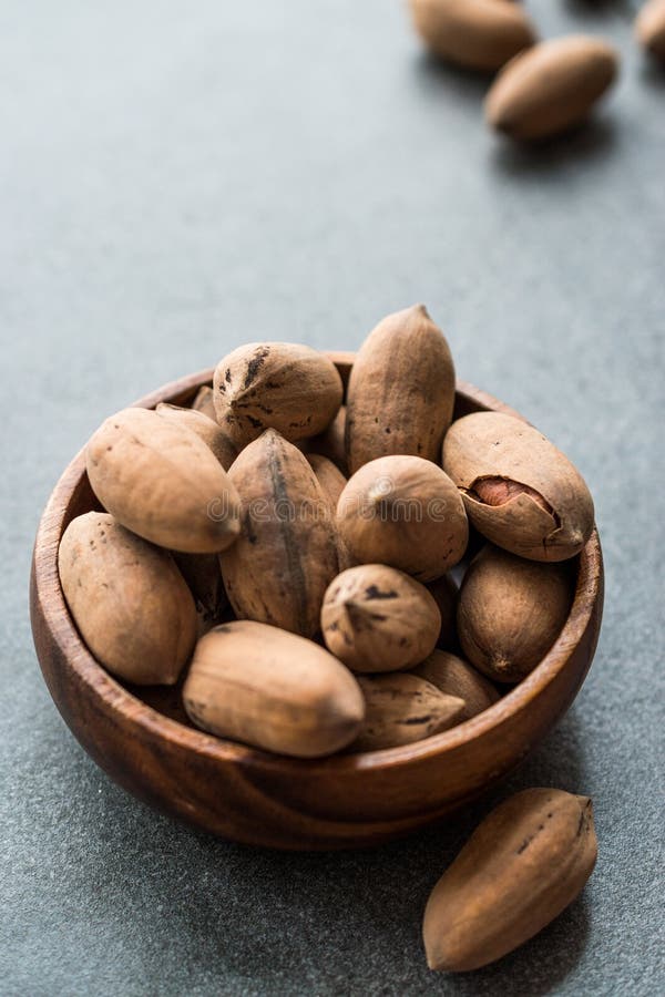 Pecan Nuts with Shell in Wooden Bowl / Walnuts Stock Photo - Image of ...